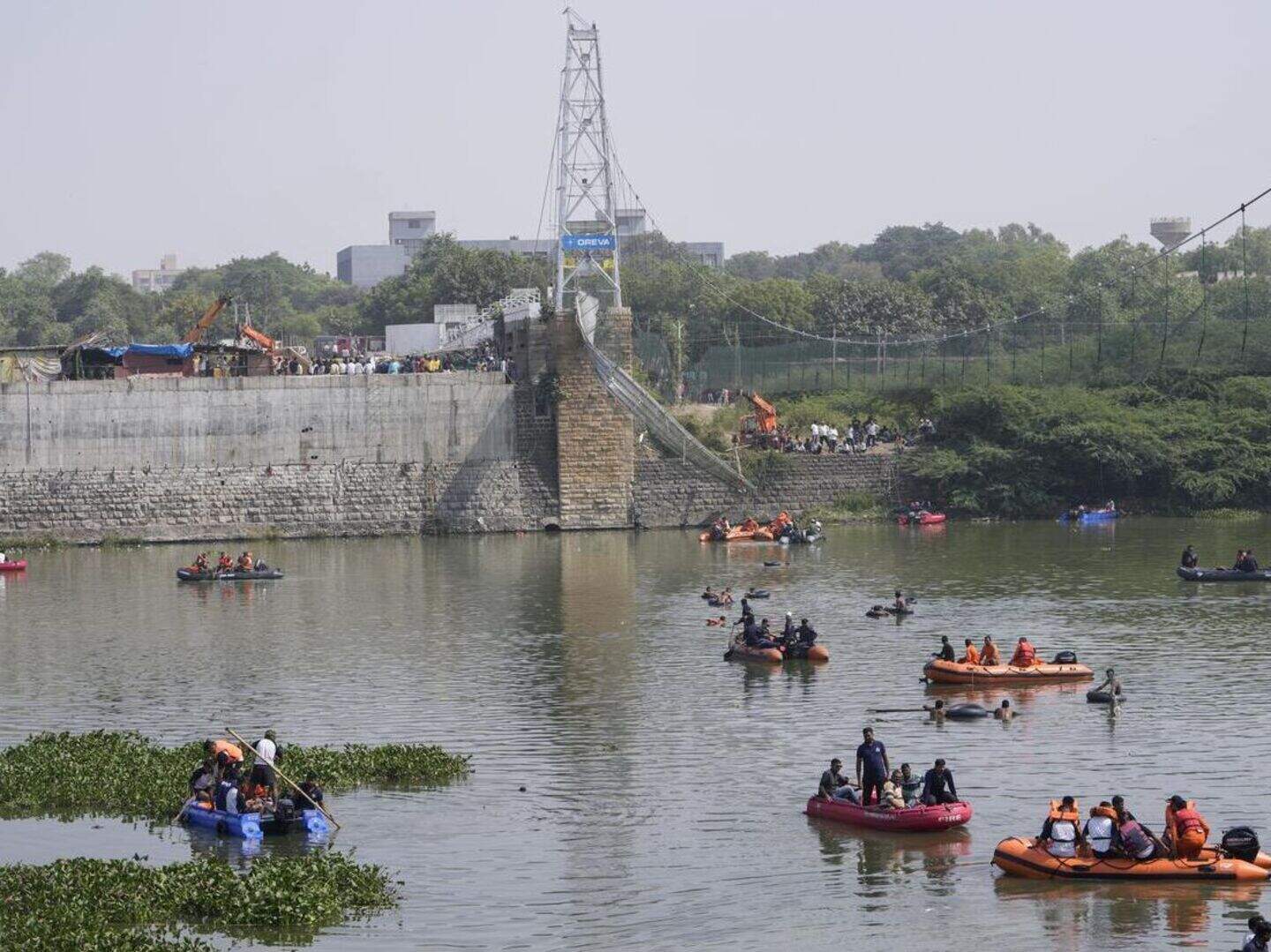 Nine arrested after bridge collapse in India kills at least 134 people ...