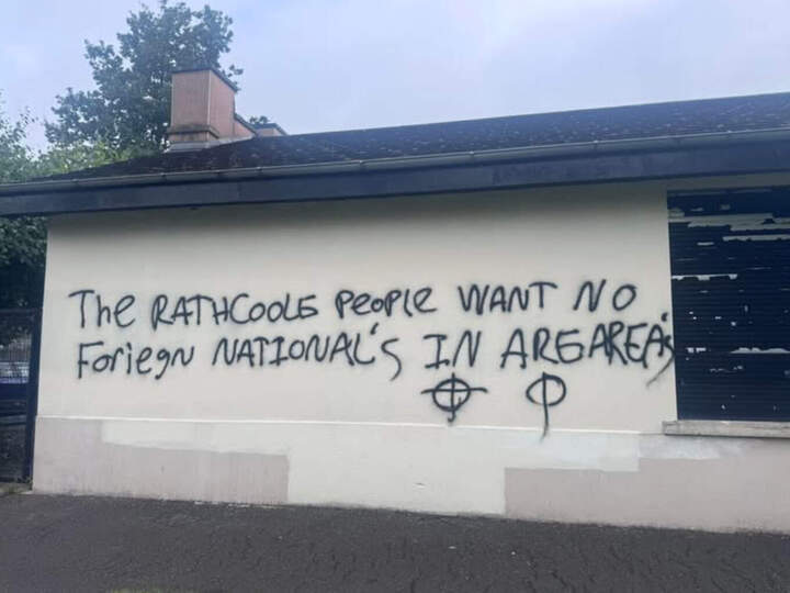 Dr Aaron Edwards: Paramilitary expert blasts racist graffiti in estate ...