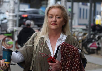 Woman tasered one bank official and punched another during home ...