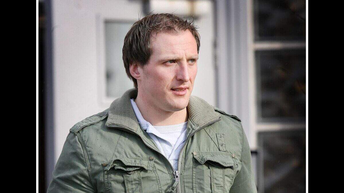 Garda decorated for bravery during armed robbery incident awarded € ...